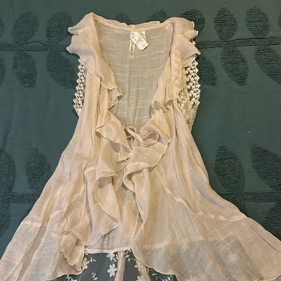 Simply Irresistible | Tops | Sleeveless Open Front Ruffles With Lace ...